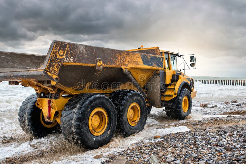 Dumper Transporting Rocks To Reinforce a Stock Photo - Image of ...