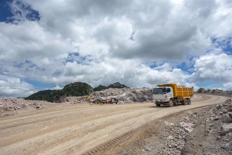 Dumper Truck Carrying Rocks in a Quarry Stock Photo - Image of lorry ...