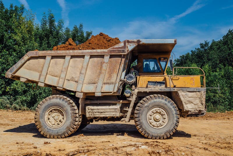 Dumper truck with soil stock photo. Image of dredger - 108652416