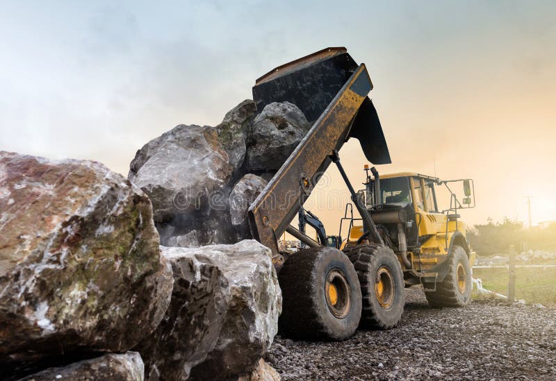 Dumper Unloading Its Cargo on a Construction Site Stock Photo - Image ...