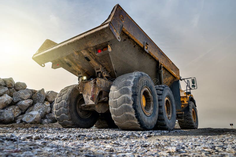 Dumper Unloading Its Cargo on a Construction Site Stock Image - Image ...
