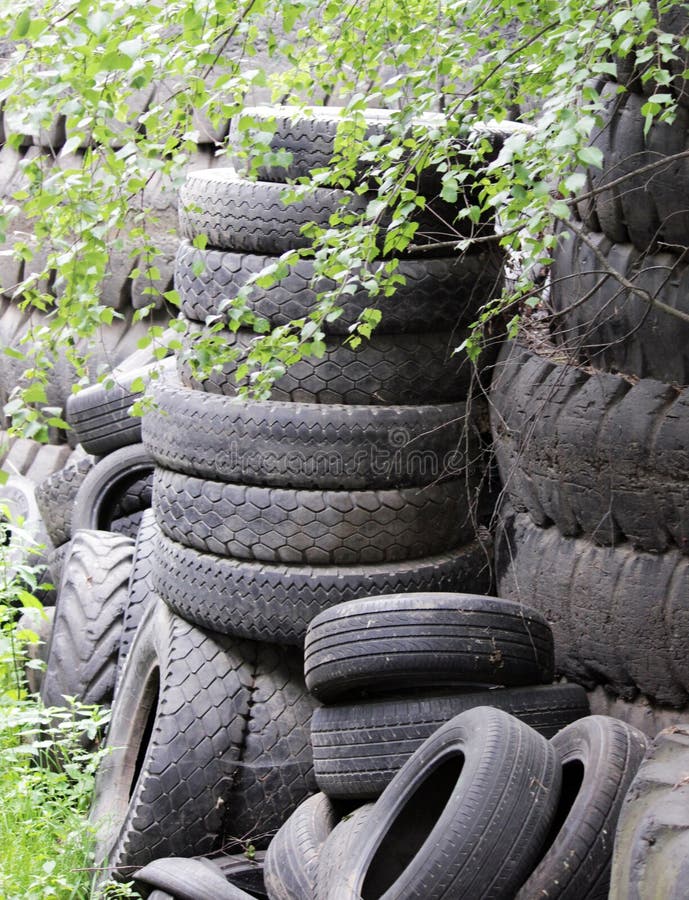 Dumping of Tires on the Wheels in the Open Air. Stock Image - Image of ...