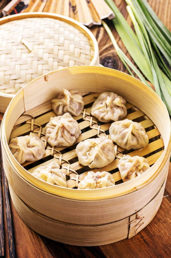 Dumpling in Bamboo Basket. stock photo. Image of chinese - 34916752