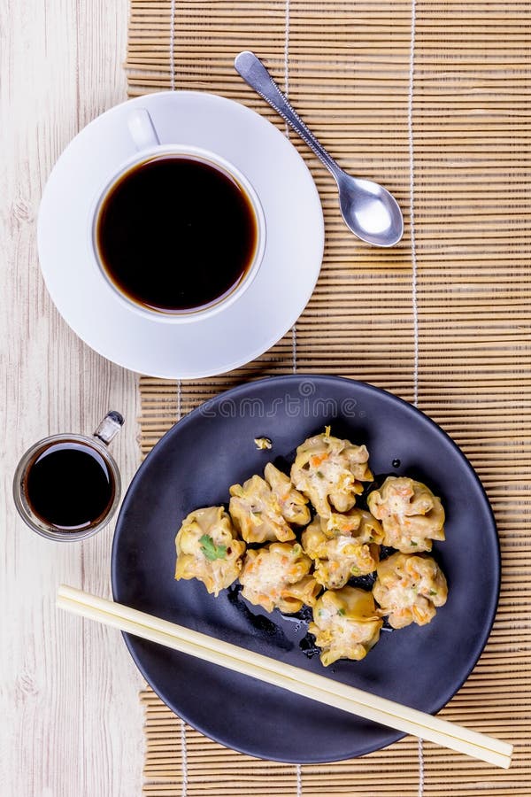 Dumpling with black coffee stock image. Image of delicious - 184014793