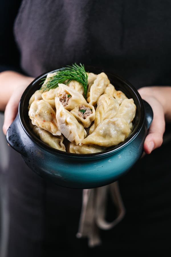 Dumplings with Dill in a Clay Pot Stock Photo - Image of green, meal ...