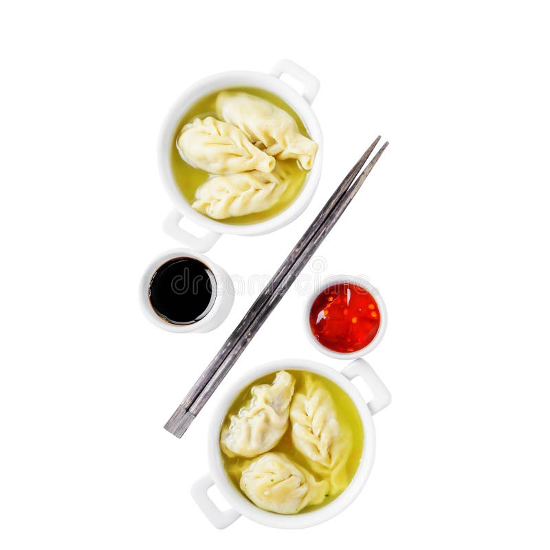 Dumplings are Served in White Cups with Sauces on a Serving Board . Top ...