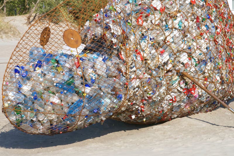 Dumpster in the Form of a Huge Fish with Garbage Inside. Stock Image ...