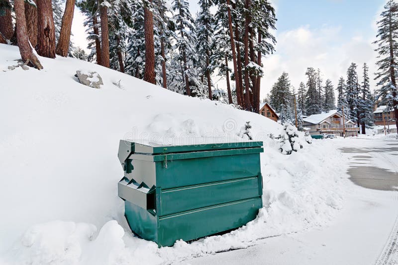 Dumpster on the Snow Covered Ground Against Houses in Daybreak Utah ...