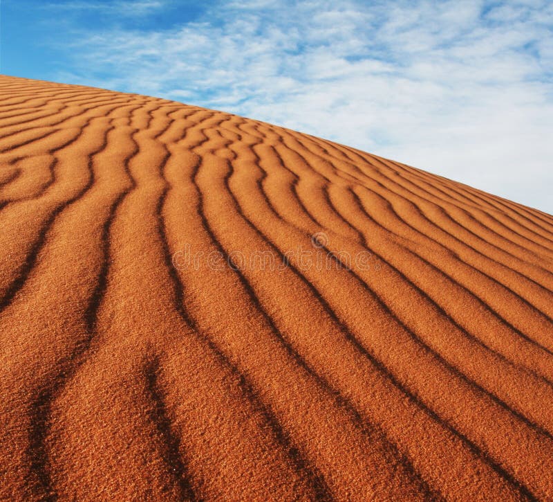 Sunlit Namibian Desert Dunes Sand Ripple Pattern Rises To Ridge. Stock ...
