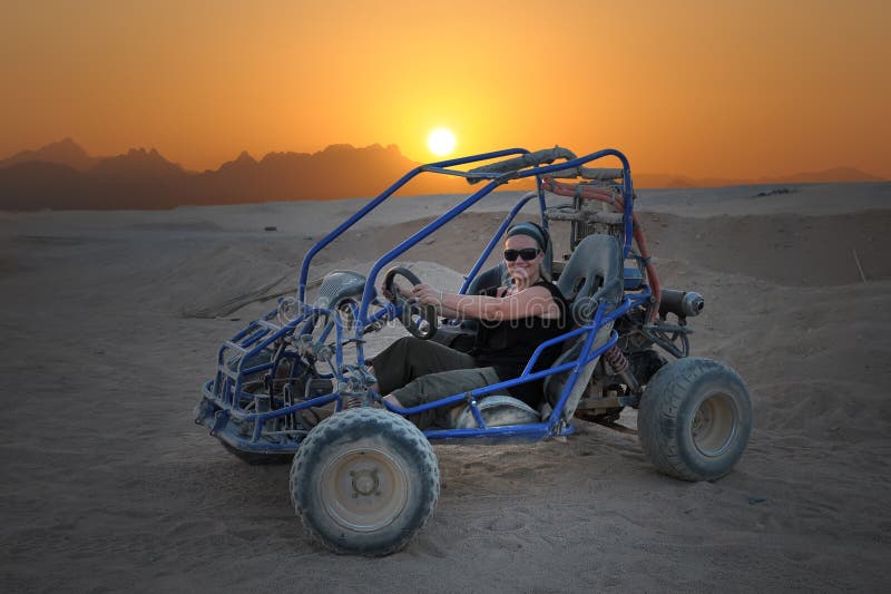 Dune Buggy in desert scene stock photo. Image of female - 7143650