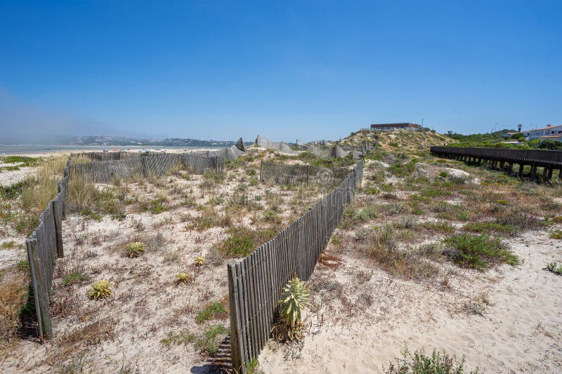 Dune Protection Fence on Obidos Lagoon Beach Stock Photo - Image of ...