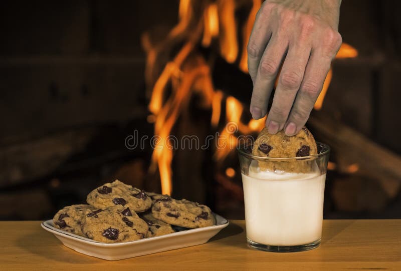 Dunking a Cookie stock image. Image of dessert, night - 67210363