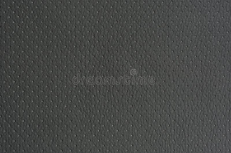 Dunkle Grey Perforated Artificial Leather Background-Beschaffenheit ...