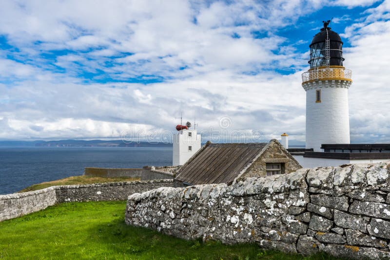 The Dunnet Head Lighthouse Overlooking the Sea Stock Photo - Image of ...