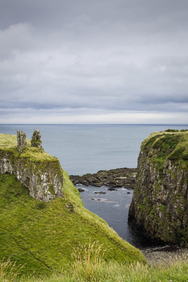 Ruins of Dunseverick Castle Atop Green Cliffs of the Causeway Coast ...