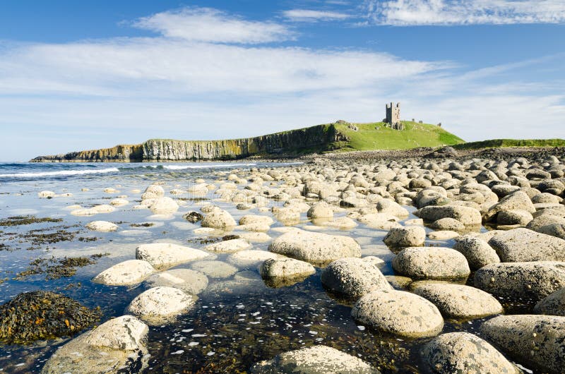 Dunstanburgh Castle stock photo. Image of cliff, ocean - 26514070