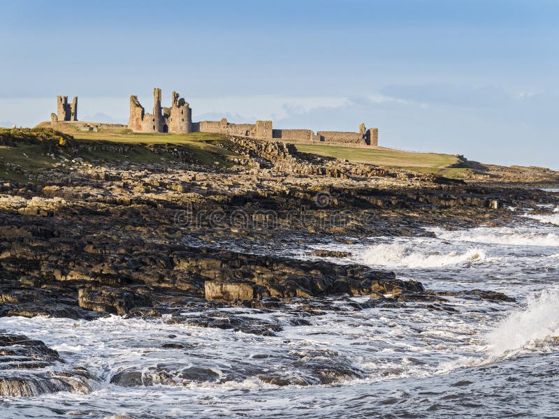 Dunstanburgh Castle on the Northumberland Coast with Copy Space Stock ...
