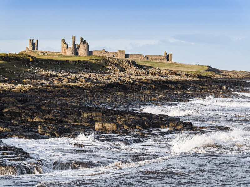 Dunstanburgh Castle on the Northumberland Coast with Copy Space Stock ...