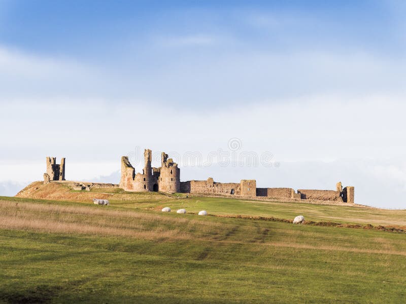Dunstanburgh Castle on the Northumberland Coast with Copy Space Stock ...