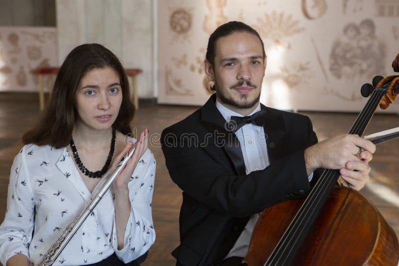 Duo of Classical Musicians Cello and Flute Stock Photo - Image of young ...