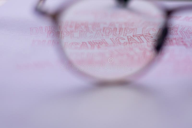 DUPLICATE red rubber stamp stock image. Image of specs - 384947885