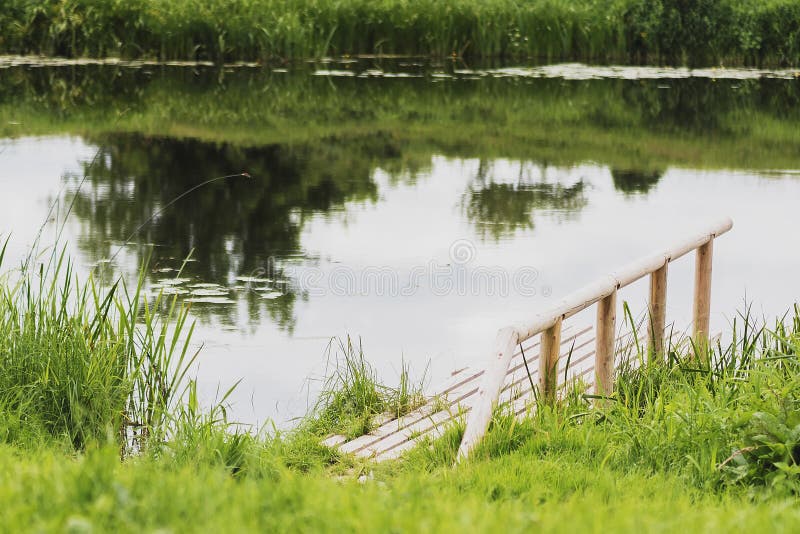 Durable Wooden Dock on the River for Fishing Stock Photo - Image of ...