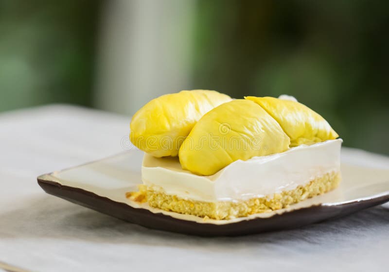 Durian cake on table stock illustration. Illustration of white - 316144212