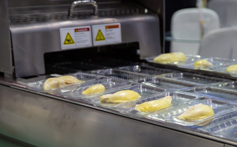 Durian on packing machine stock photo. Image of machinery - 152697634