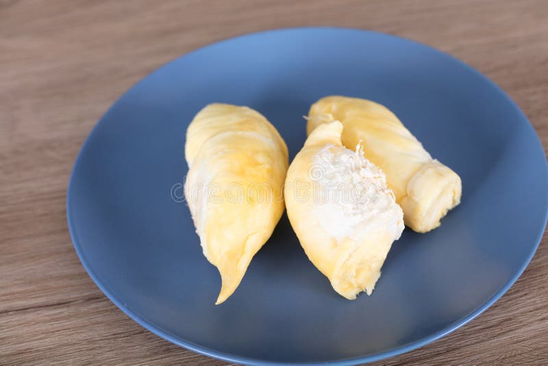 Durian pulp on the plate stock photo. Image of looking - 253527882