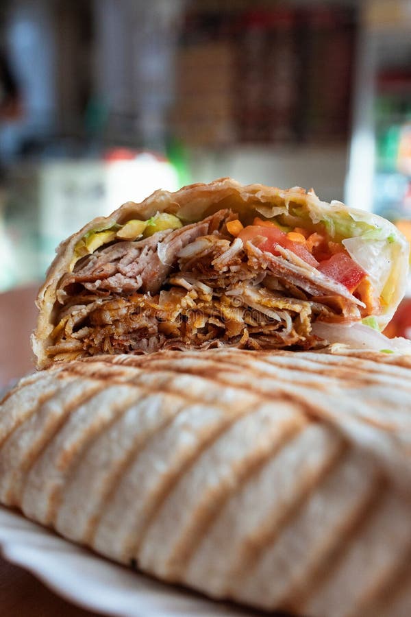 Durum Kebab Cut in Half. Vertical Shot . Stock Photo - Image of snack ...