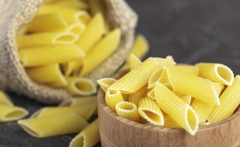 Durum Wheat Pasta in a Wooden Bowl Stock Photo - Image of food, wheat ...