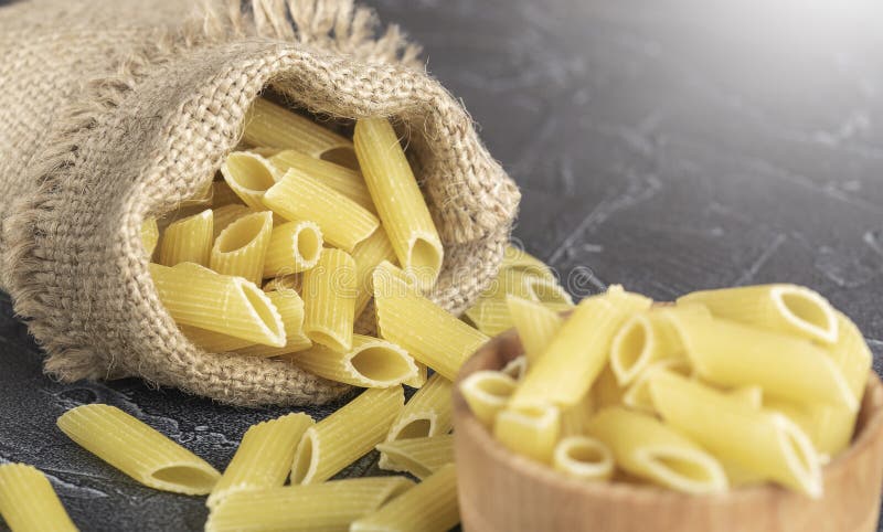 Durum Wheat Pasta in a Wooden Bowl Stock Image - Image of colorful ...