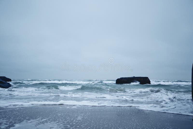 Dusk and Gloomy Ocean with Big Rocks Stock Image - Image of abstract ...