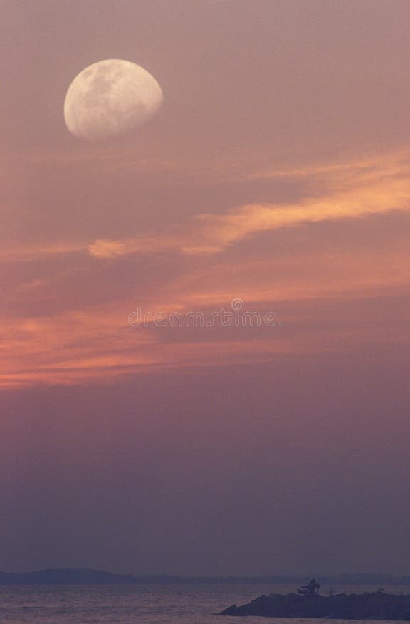 Dusk and Moon stock image. Image of moon, purple, orange - 241479