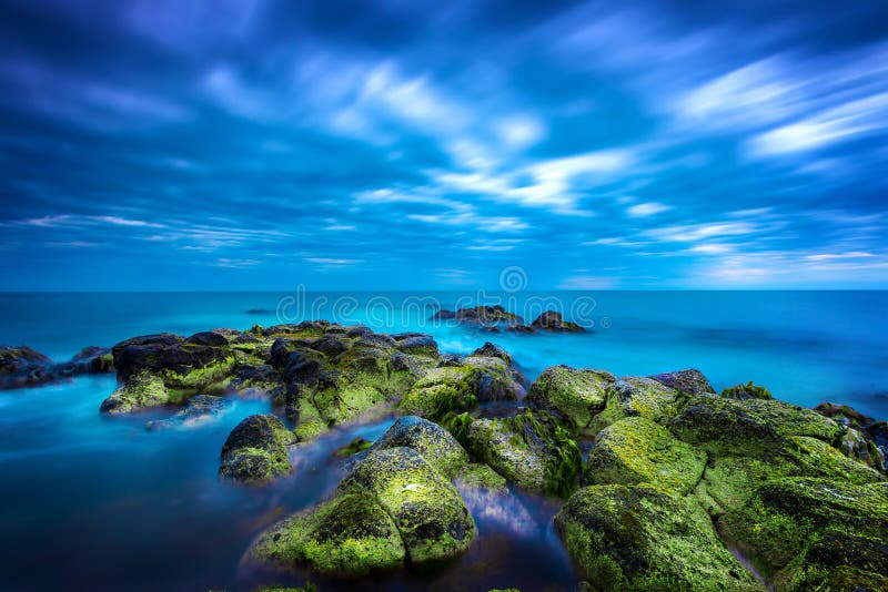 Dusk Over Calm Blue Sea Over Ocean and Cloudy Sky Stock Image - Image ...
