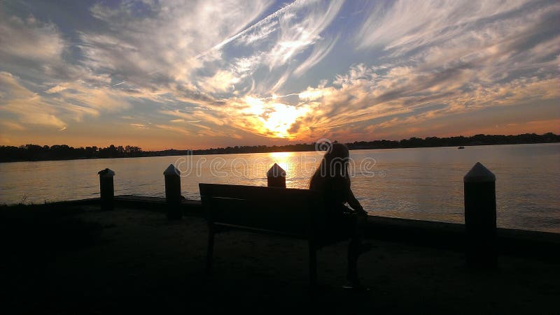 Dusk over water stock photo. Image of lady, pretty, dusk - 49605218