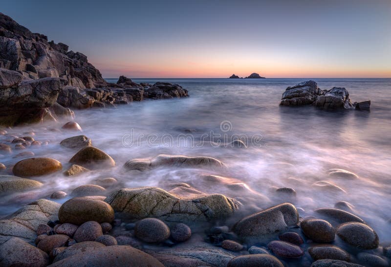 Dusk, Porth Nanven, with Beautiful Light Over the Rocks and Peb Stock ...