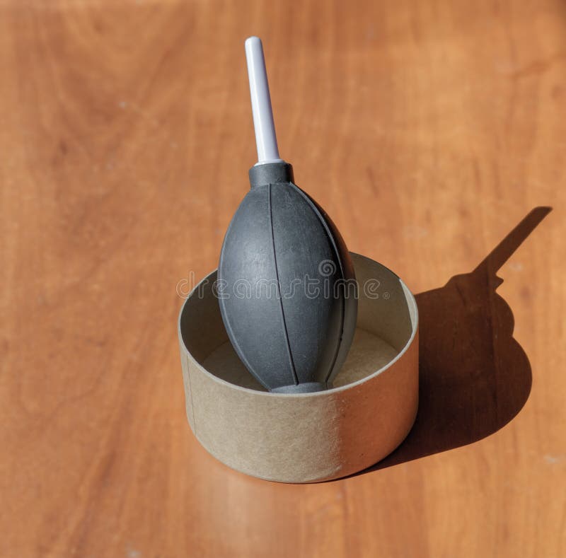 Dust Blower in a Cardboard Box Stock Photo - Image of morning, black ...