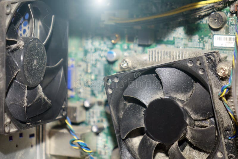 Dust on Computer PC CPU Cooler with Motherboard and a Fragment of the ...