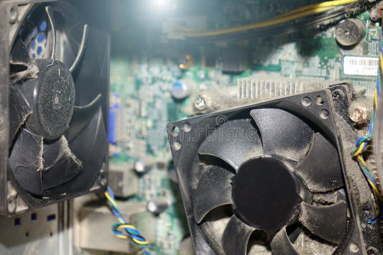 Dust on Computer PC CPU Cooler with Motherboard and a Fragment of the ...