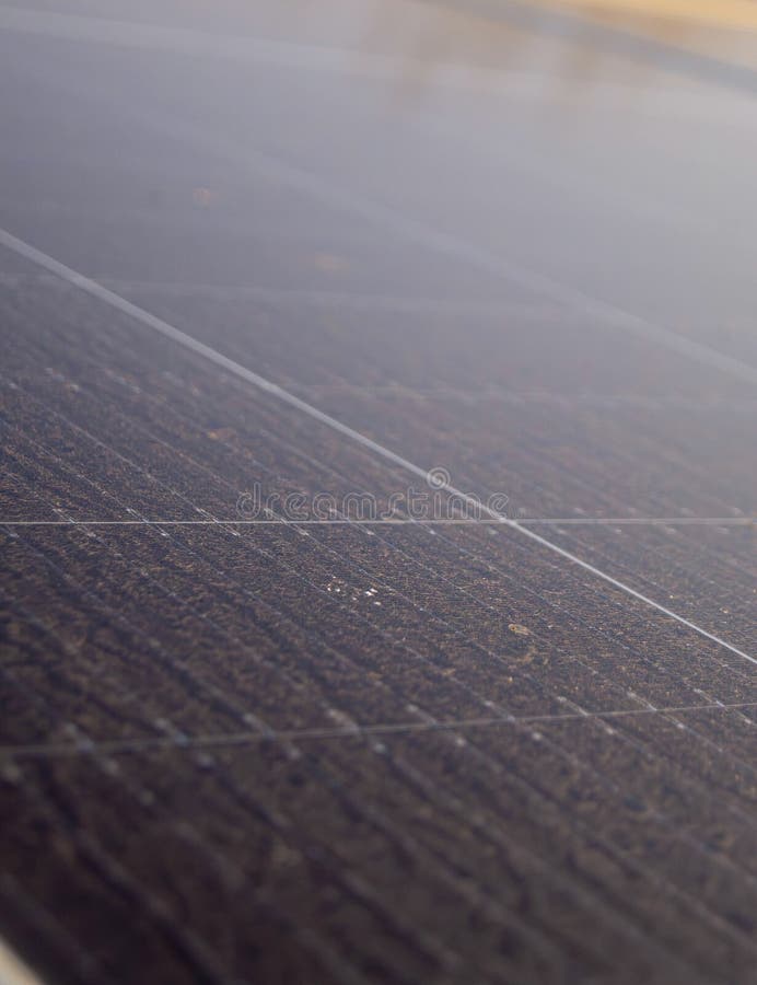 Close-up of a Dusty Solar Panel Surface with Visible Dirt and Grid ...
