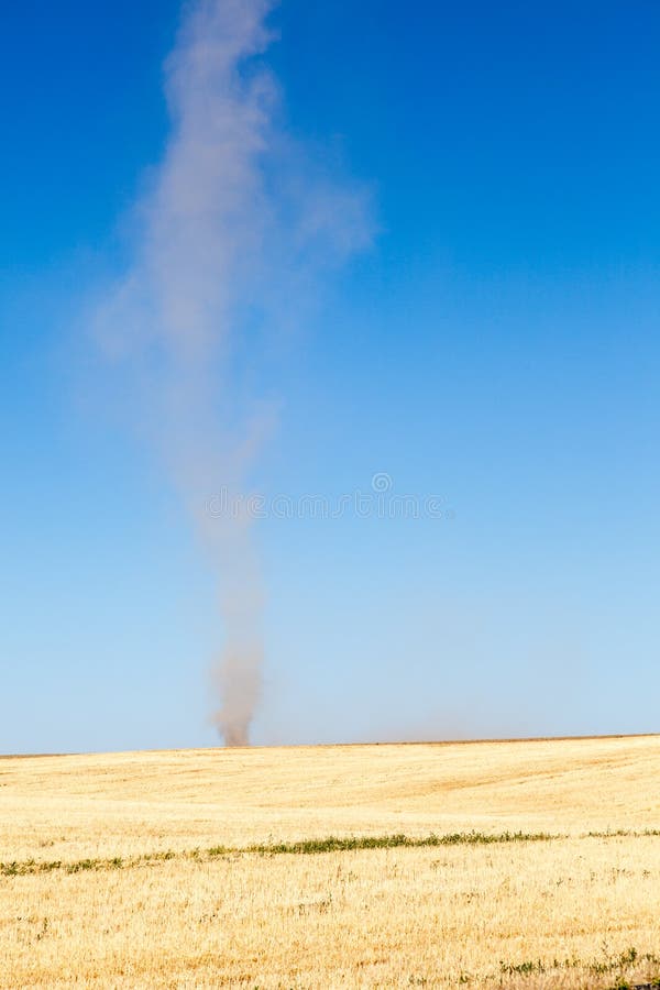 Dust Devil in a Field stock image. Image of devil, grasslands - 35653499