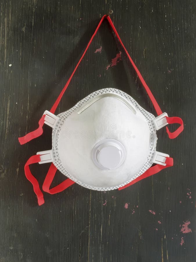 Dust Mask and Hearing Protection Ear Muffs. Stock Image - Image of ...