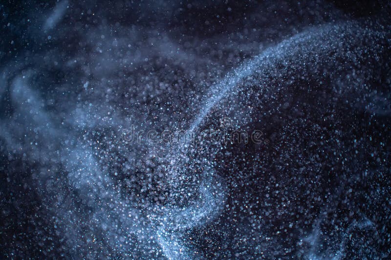 Dust Particles Cloud Generating Abstract Shape on Black Background with ...