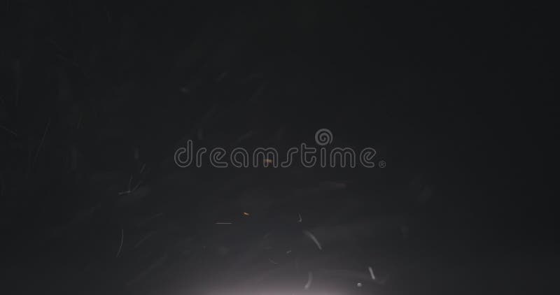 Dust Particles Fast Moving Over Black Background from Below Stock Image ...