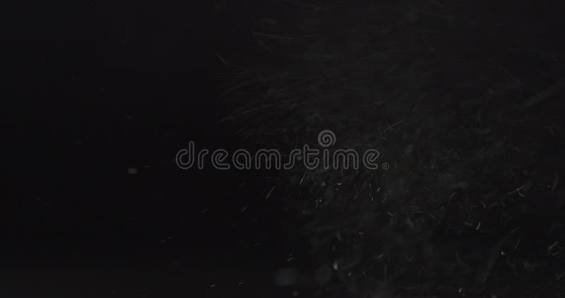 Dust Particles Fast Moving Over Black Background from Right Stock Photo ...