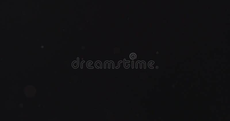 Dust Particles Fast Moving Over Black Background from Right Stock Photo ...