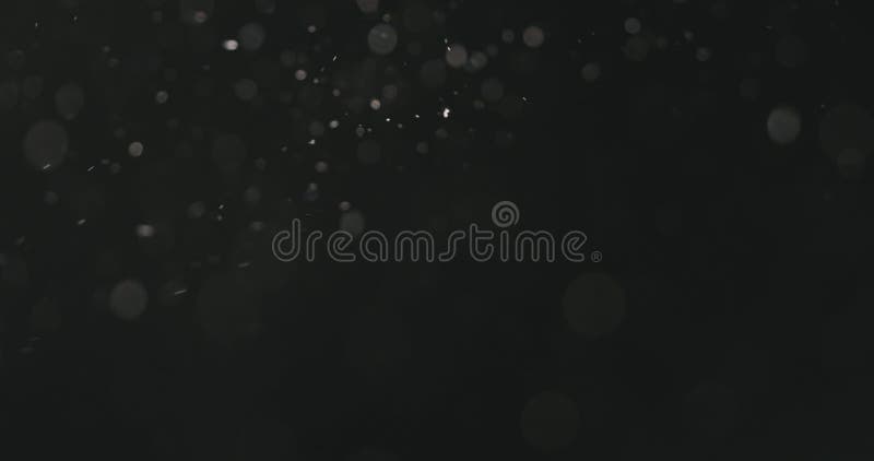 Dust Particles Floating Over Black Background with Motion Blur Stock ...