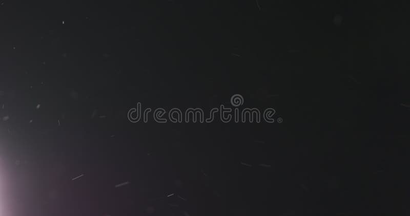 Dust Particles Fly in the Air Over Black Background with Light Leak ...