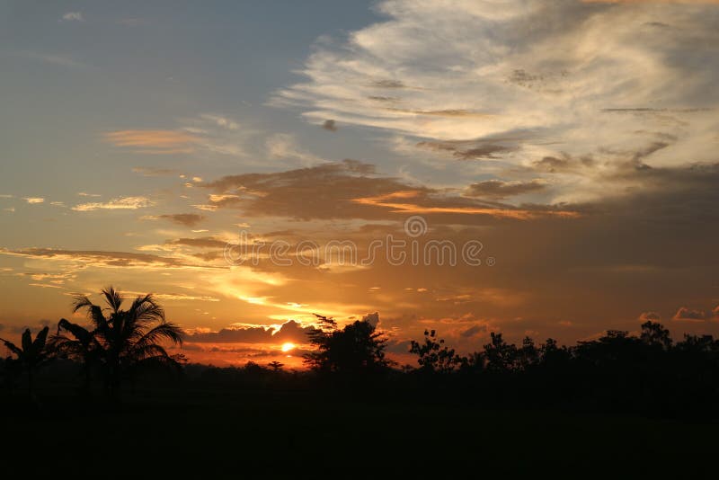 Dust till down dark sunset stock image. Image of sunlight - 265439113